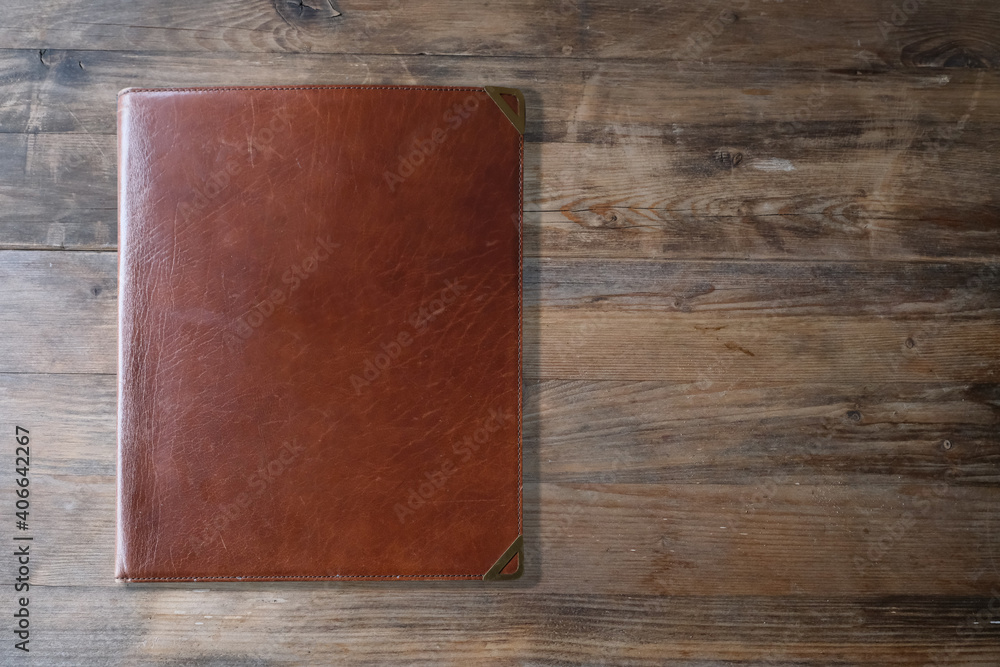 Front Back of Restaurant Menu Folder in Brown Leather on white ...