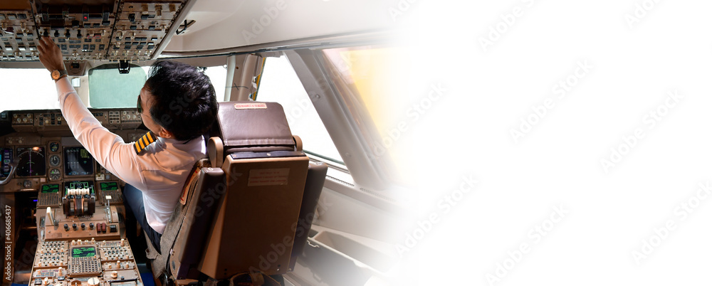 Airline pilot work in the cockpit. View from the cockpit on the clouds ...