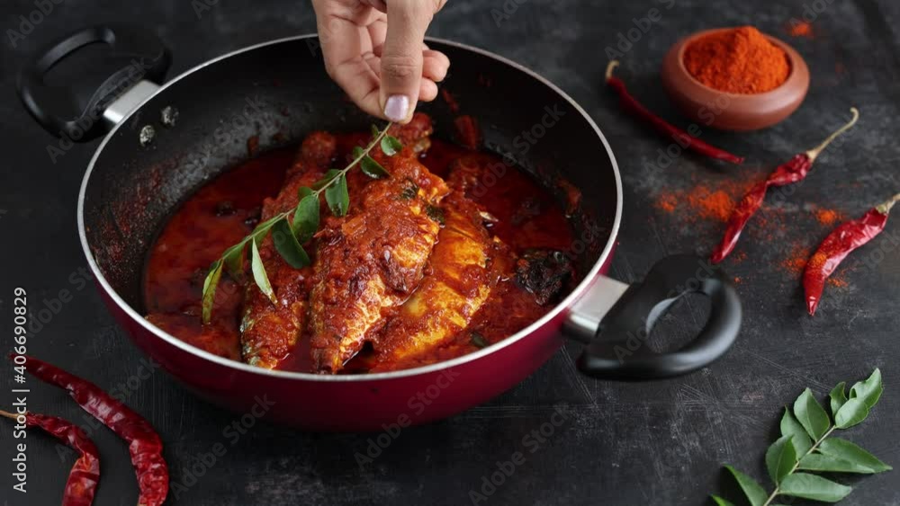 Spicy Mackerel fish curry gravy , cooking spicy Kerala fish curry ...