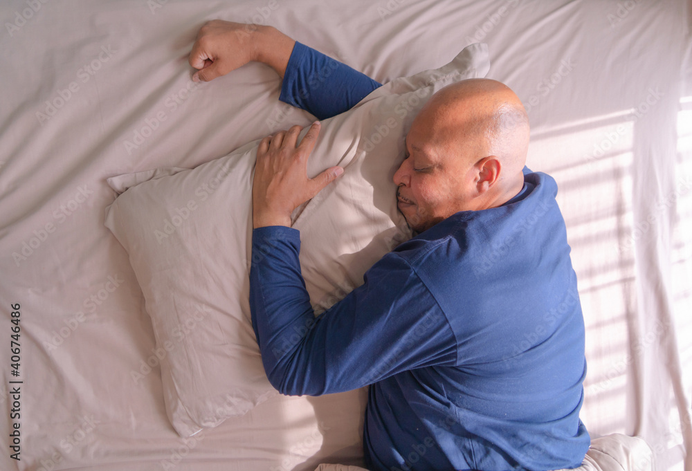 Sleepy old elderly black man yawning. African American people lying and ...