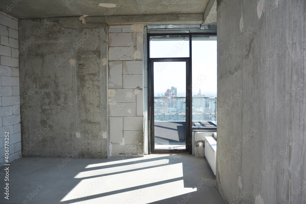 An inside view of an empty newly constructed apartment, flat without ...