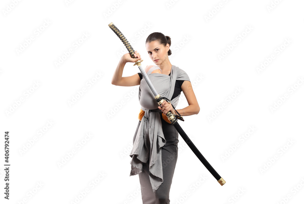 Beautiful young babywearing mother with japanese sword protects her ...