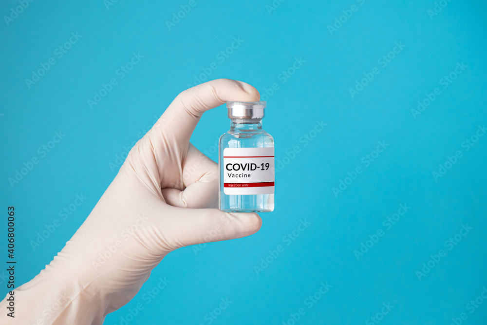 coronavirus COVID-19 vaccine and immunization concept. hand in white ...
