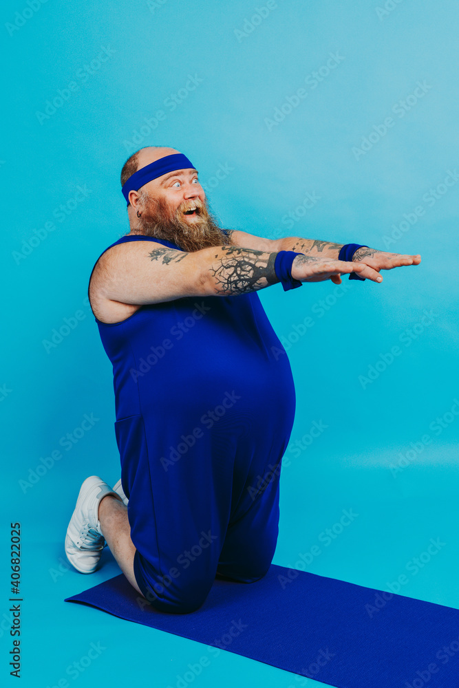 Fat man doing sport Stock Photo | Adobe Stock