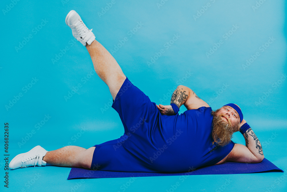 Fat man doing sport Stock Photo | Adobe Stock
