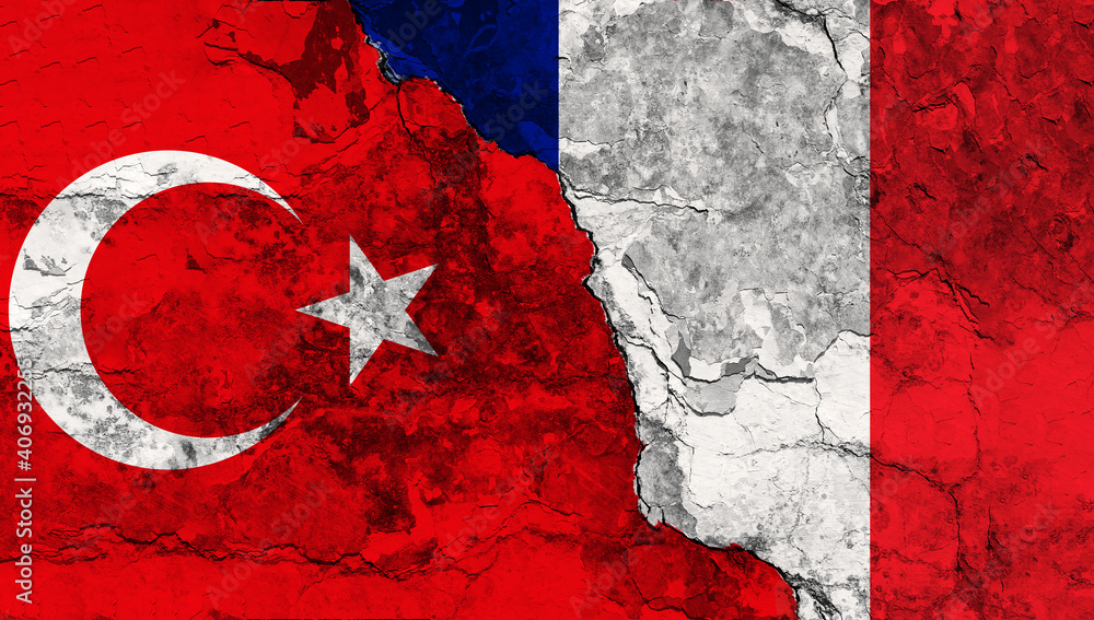 Concept of the Conflict between Turkey and France with painted Flags on ...