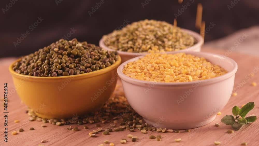 Falling Yellow moong dal, Indian pulse, yellow mong dal and green Moong ...