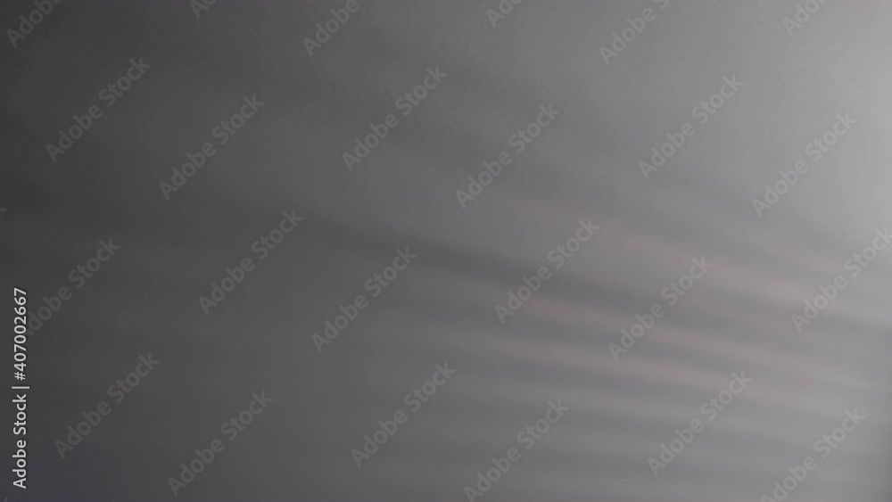 Blurry dark shadows moving on the wall. Spooky shadow art noise texture ...