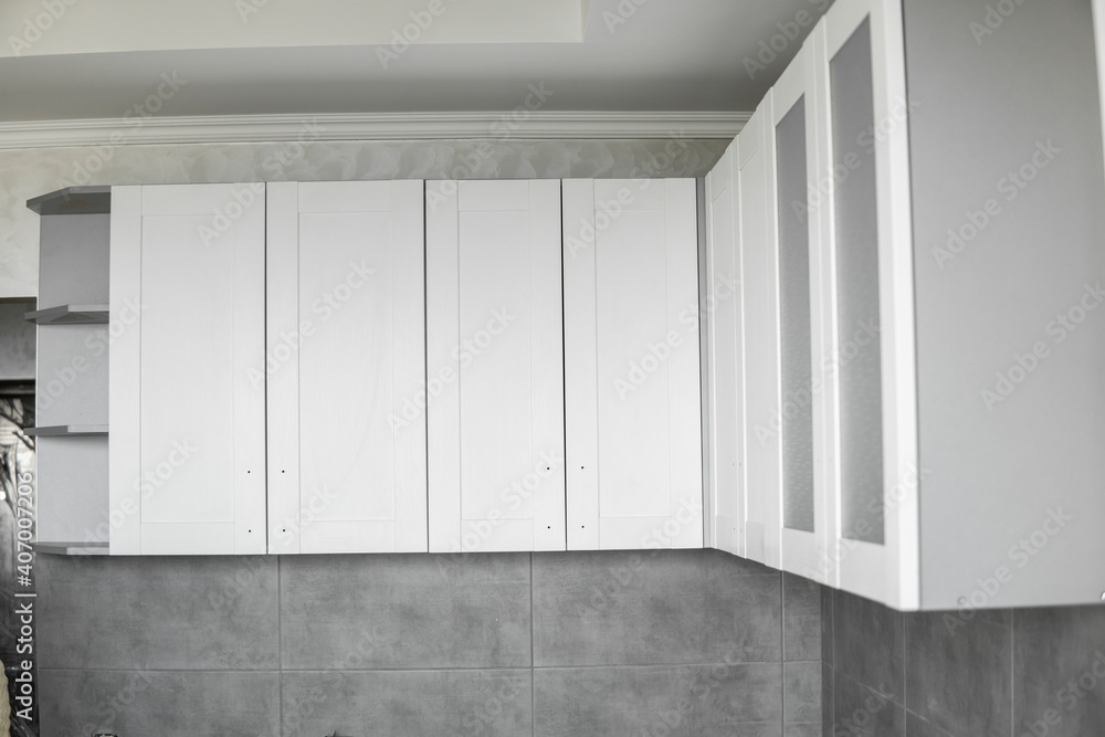 Custom kitchen cabinets installation with a white furniture facades mdf ...