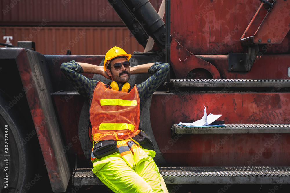 Engineer beard man standing with ware a yellow helmet to control ...