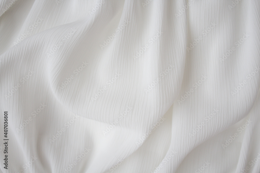 The texture of a luxurious white chiffon fabric for a celebration ...