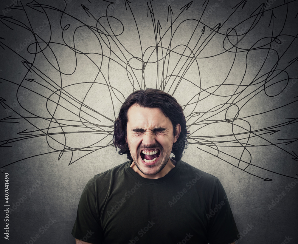 Angry and frustrated man screaming and yelling, eyes closed. Mess lines ...