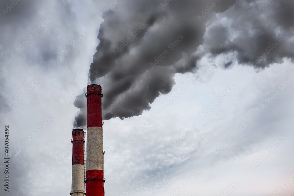 Foto de Smoke from the pipe. Smoking pipes in the sky industrial areas ...