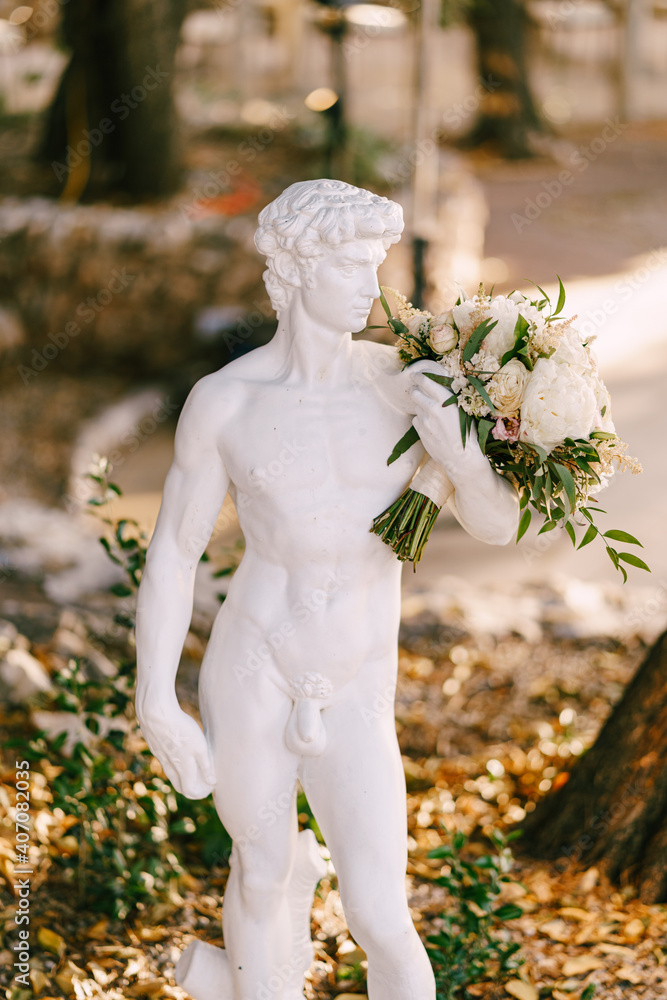 Greek antique sculpture of a young stately David with the bride's ...