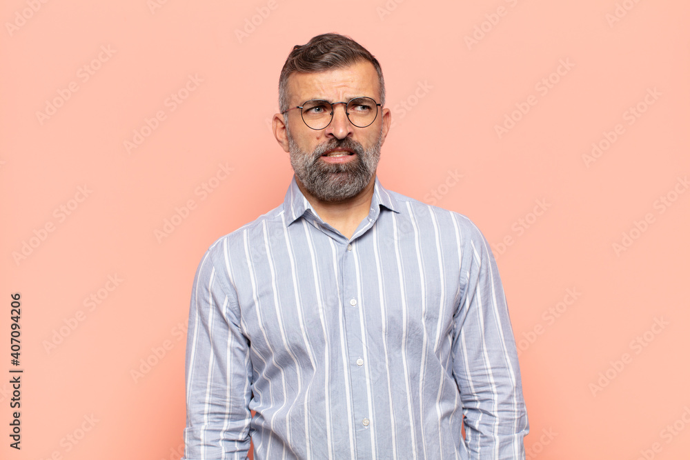 adult handsome man looking worried, stressed, anxious and scared ...