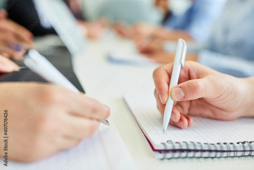 Hands of business people take notes Stock Photo | Adobe Stock