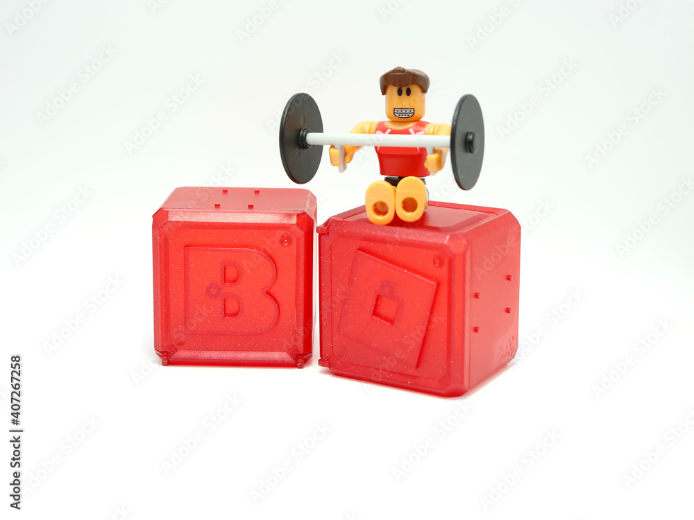 Roblox toy. Surprise toy. Strogman. Videgame. Plastic red box. Man ...