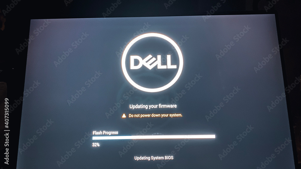 Fotka „Dell logo on the black screen of laptop - firmware update system ...
