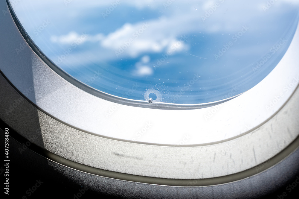 Tiny hole or bleed hole in airplane window compensate for difference ...