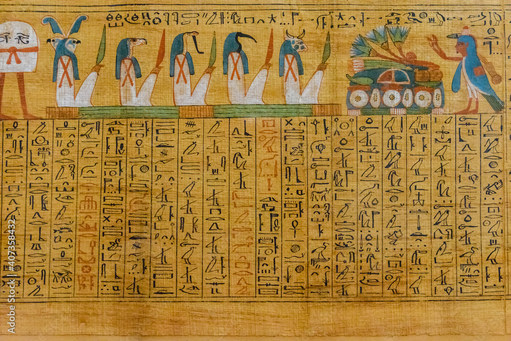 Egyptian ancient papyrus with the different pictures and hieroglyphics ...