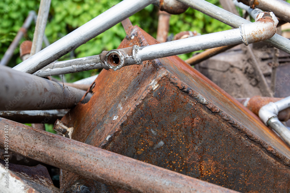 Foto de Scrap metal stack. Plumbing pipes, fittings and sheet metal ...
