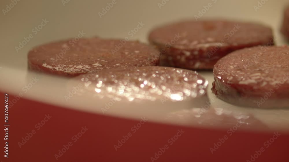 Close up.Turkish sausage (Sucuk). Sausage cooked with butter in a ...