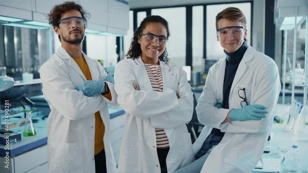 Medical Science Laboratory with Team of Three Young Successful ...