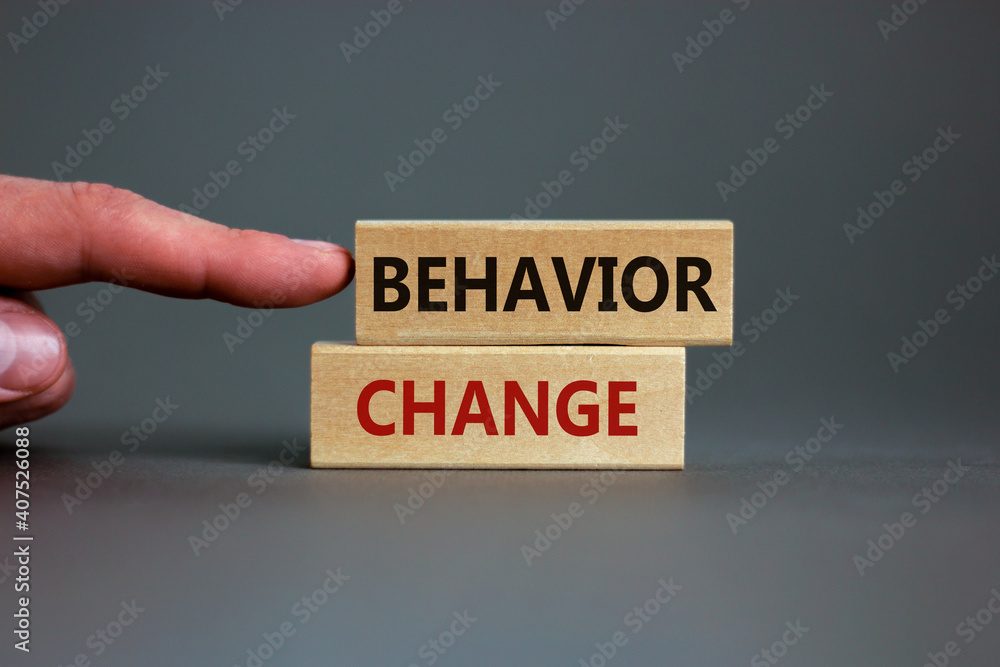 Time to behavior change symbol. Wooden blocks with words 'behavior ...