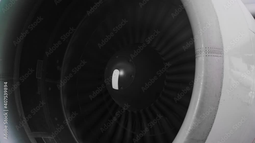 Airplane jet engine and landing gears moving forward. Engine of ...