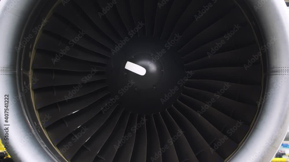 Airplane jet engine and landing gears moving forward. Engine of ...