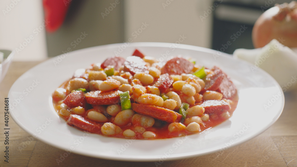 Turkish food Kuru fasulye pilav (navy beans and rice) with sucuk ...