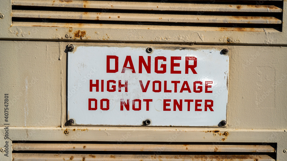 Old Danger high voltage warning sign Stock Photo | Adobe Stock