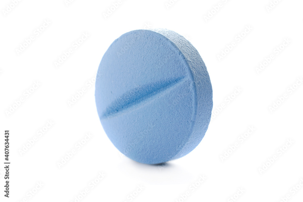 One blue pill close-up, isolated on white background. Macro photo of a ...