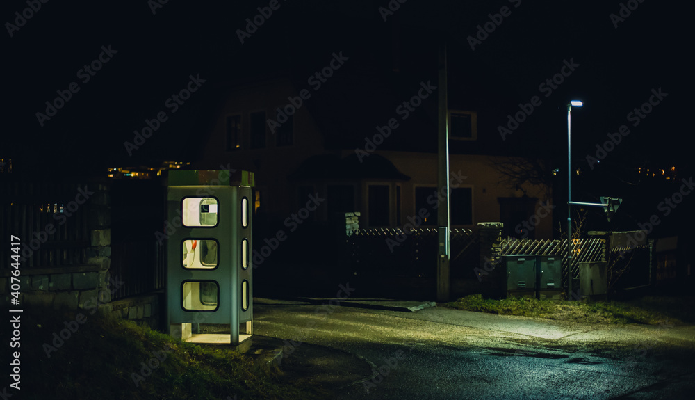 night telephone booth. mystical and mysterious street phone. dangerous ...