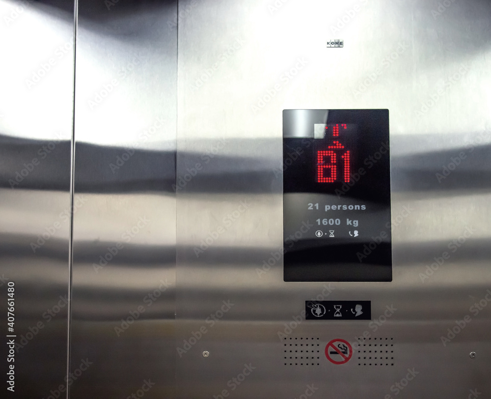 Elevator number panel on metal background electric words sign Stock ...