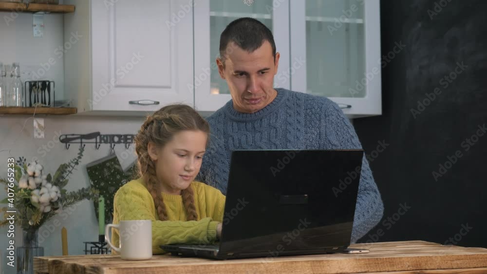 Happy family. Parent helps her daughter do her homework for school ...
