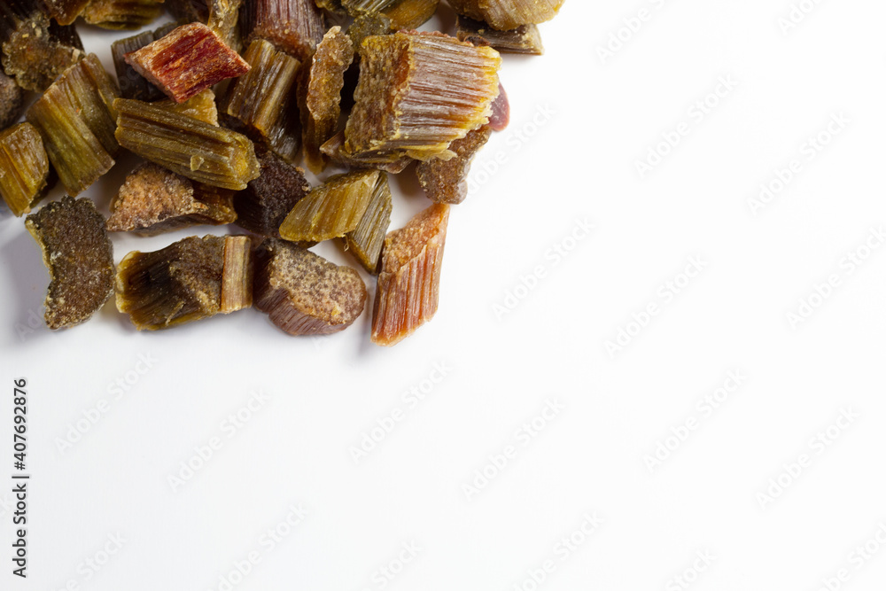 Dried rhubarb candied fruits. Candied rhubarb on a white background ...