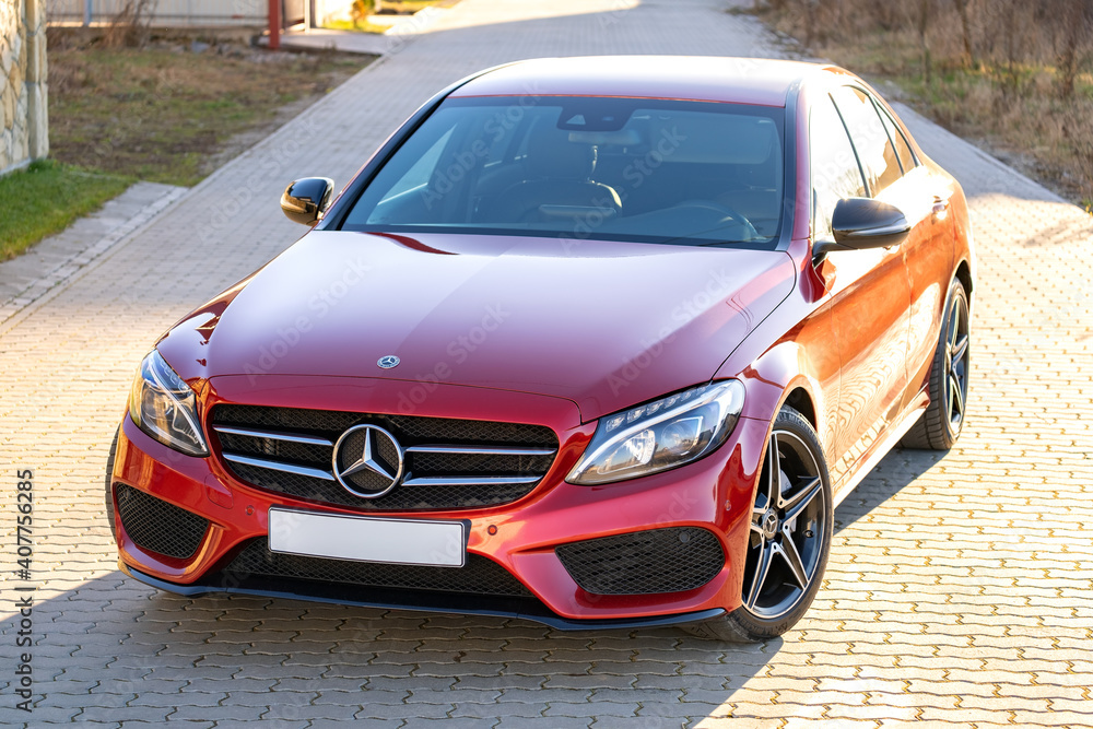 Red Mercedes Benz C Class