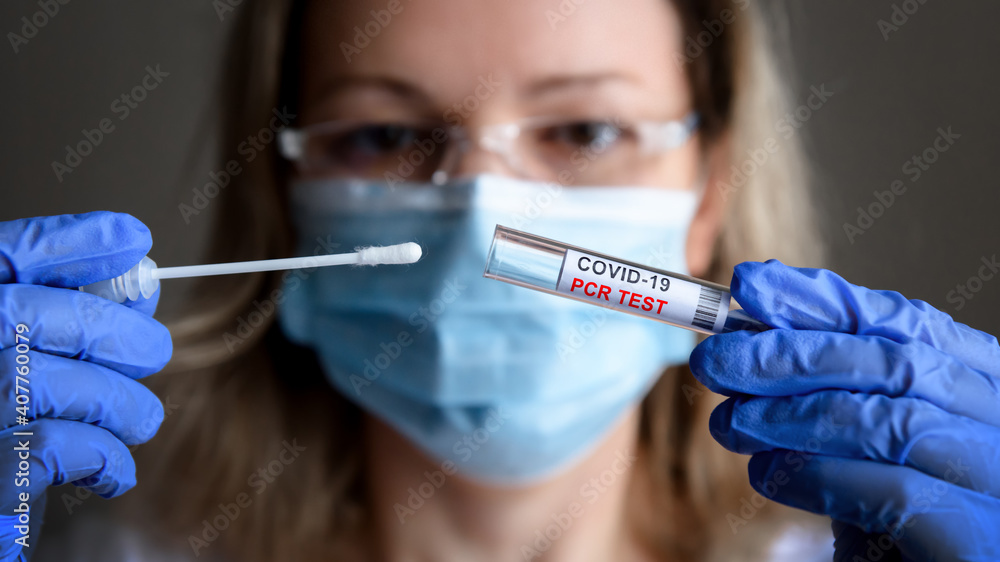 Coronavirus swab collection kit in doctor hands, tube to COVID-19 PCR ...