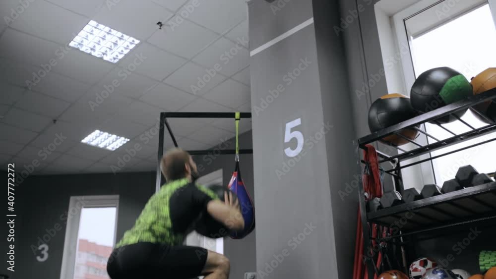 Vidéo Stock Low angle back view of muscular male athlete throwing ...