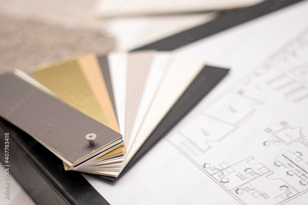 Interior designer's working table, an architectural plan of the house ...