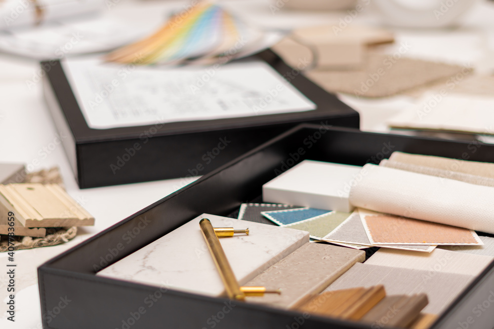 Interior designer's working table, an architectural plan of the house ...