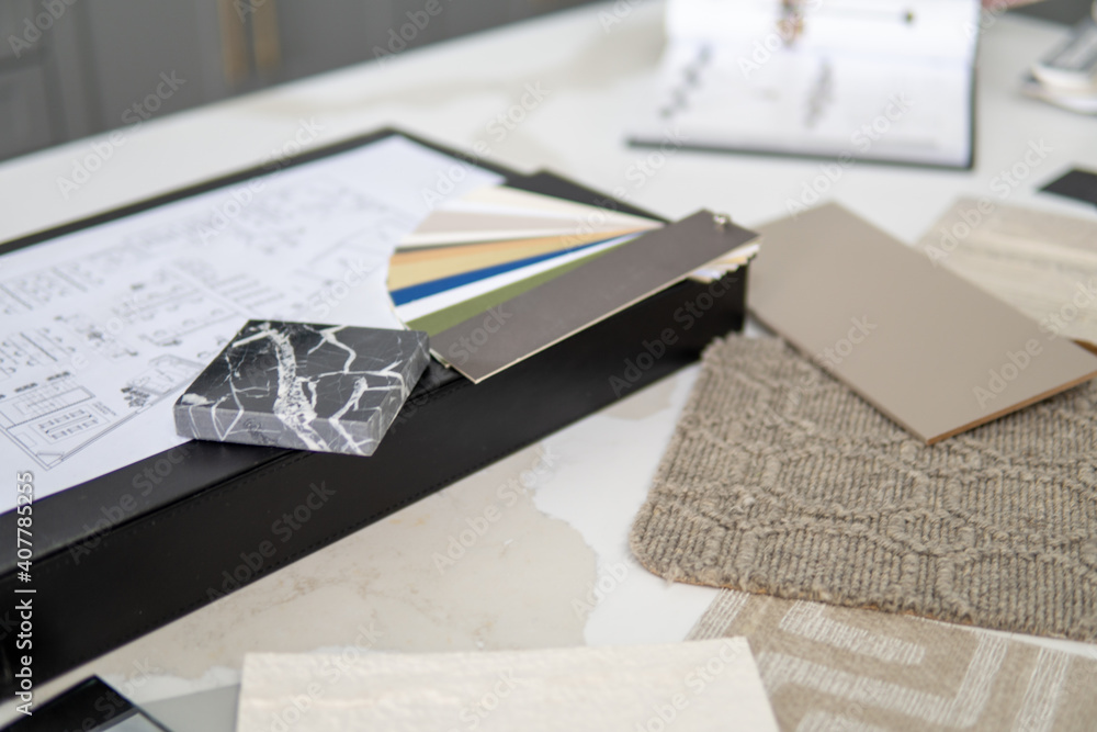 Interior designer's working table, an architectural plan of the house ...