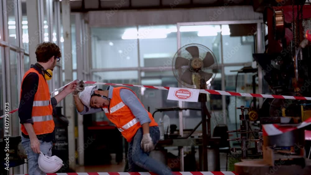 factory worker walking out restricted area in factory workplace. young ...