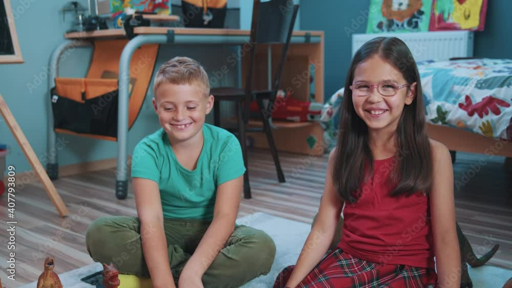 Portrait of amazing two kids siblings laughing cheerfully having fun ...