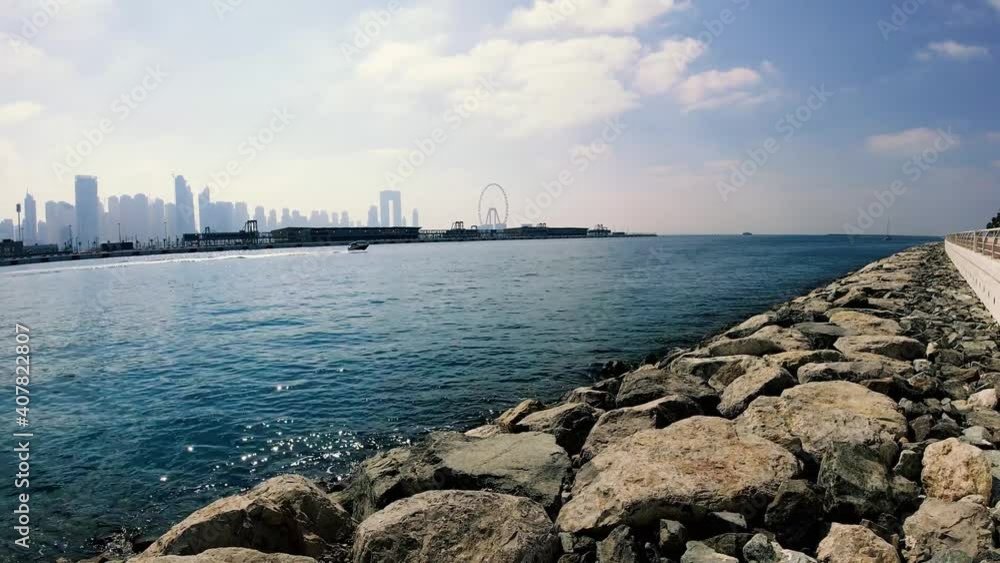 Dubai, UAE - CIRCA 2021: Time lapse of Dubai Marina skyline . Boats and ...