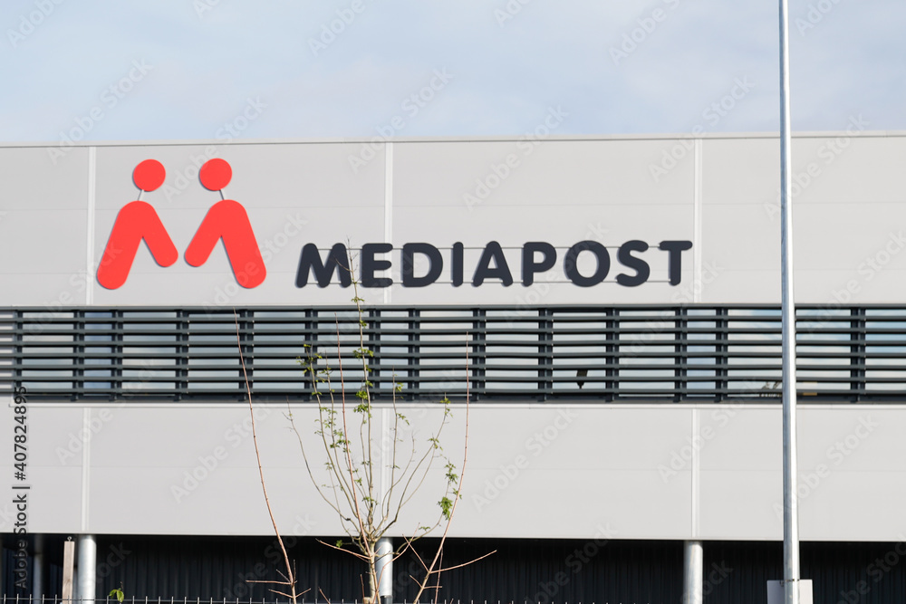 MEDIAPOST logo and sign text on headquarter building of french post ...