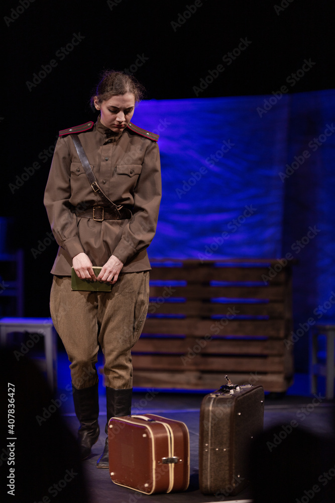Actors in military uniforms of the Soviet army of World War II play a ...