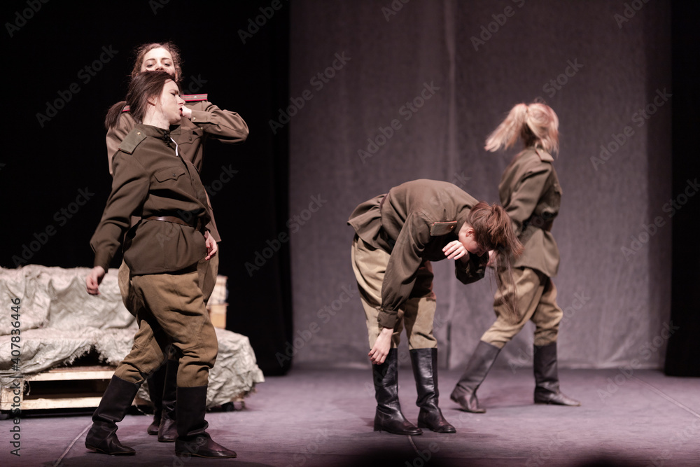 Actors in military uniforms of the Soviet army of World War II play a ...