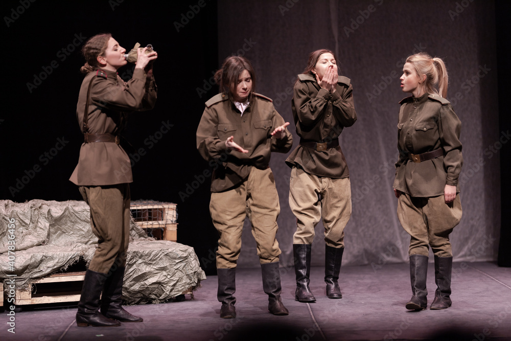 Actors in military uniforms of the Soviet army of World War II play a ...
